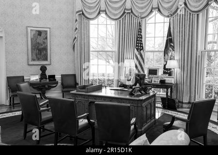 President Joe Biden at his desk in the Oval Office of the White House ...