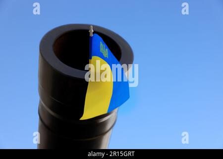 Ukrainian flag in muzzle of tank outdoors Stock Photo - Alamy