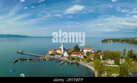 Aerial panorama of the moated castle peninsula on Lake Constance with ...