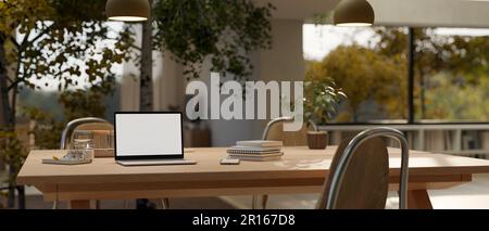 Contemporary working space with laptop, books, stationery and supplies ...