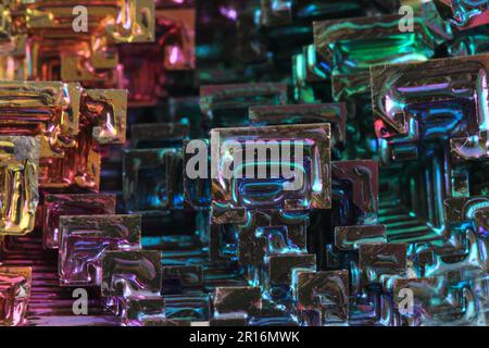 Bismuth - rainbow metal texture as color background Stock Photo - Alamy