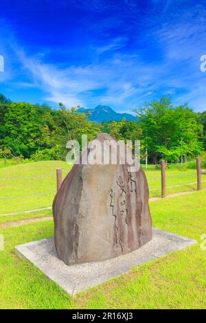 The Haiku monument of Issa Kobayashi and Mount Myoko Stock Photo - Alamy