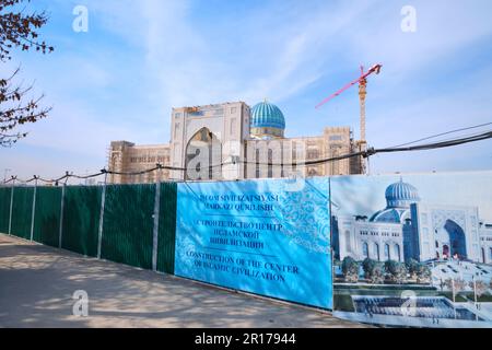 View of the large site with contruction fence and sign. At the huge ...