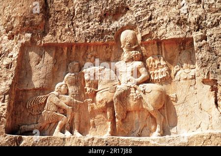 Triumph of Shapur I over Roman emperor Valerian, relief Iran Stock ...