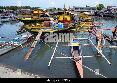 The Philippines, Samar Island, Calbayog: fishing boat with outriggers ...