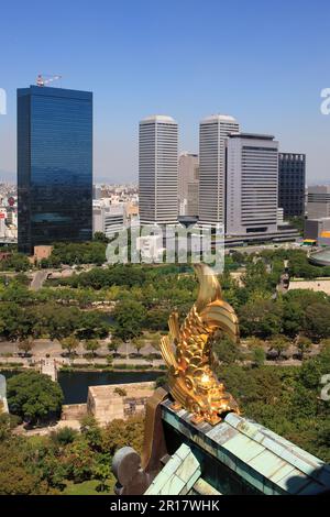 Golden dolphins surmounting the tower of Osaka Castle and Osaka's ...