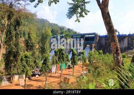 Water rushing through gates at the peruvannamuzhi (peruvannamoozhi) dam ...