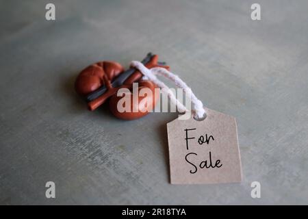 Human kidney with tag FOR SALE. Organ trafficking, organ transplant and ...