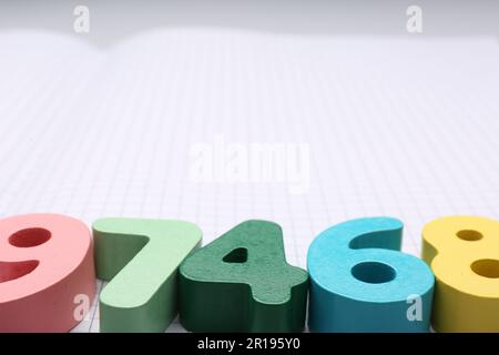Colorful numbers on notebook with grid pages. Space for text Stock ...