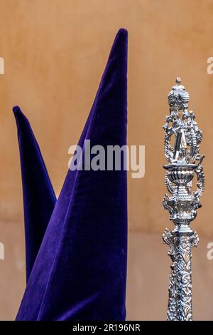 Capirotes during a procession for the holy week in Grenada, Spain ...