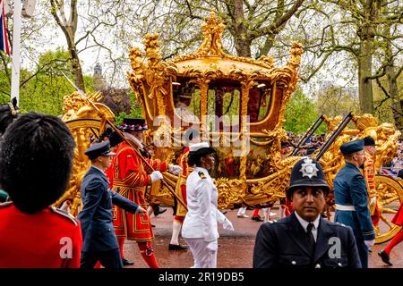 The carriage of King Charles III, Queen Camilla, the Duke of Wellington ...