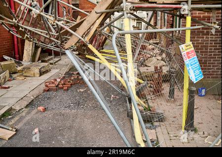 Building scaffold collapsed in alleyway Stock Photo - Alamy