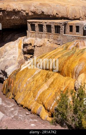 The Inca Bridge ruins. Abandoned spa building at Puente del Inca ...