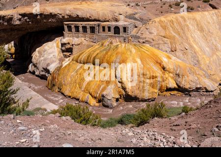 The Inca Bridge ruins. Abandoned spa building at Puente del Inca ...