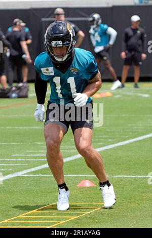 Jacksonville Jaguars wide receiver Parker Washington (11) reaches for a ...