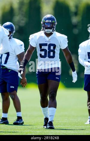 Seattle Seahawks linebacker Derick Hall (58) and Seattle linebacker ...