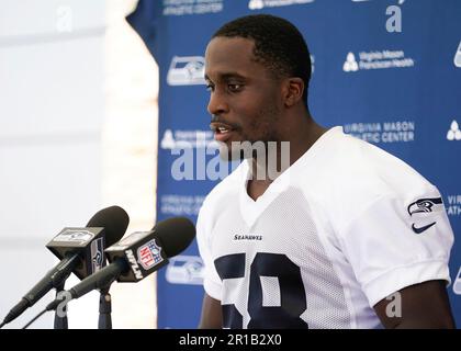 Seattle Seahawks linebacker Derick Hall (58) and Seattle linebacker ...