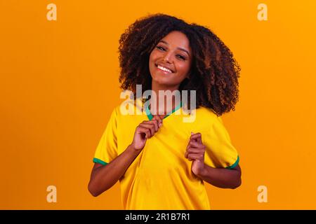 Brazilian soccer player, celebrating on a yellow background Stock Photo ...
