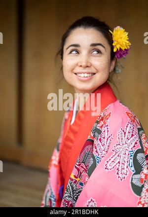 Beautiful Woman wearing traditional Okinawan ryusou / ryuso clothing of Ryukyu Islands / Okinawa ...