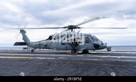 An MH-60S Knighthawk, attached to the "Tridents" of Helicopter Sea ...