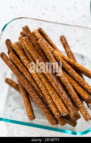 Chocolate-covered pretzel rods Stock Photo - Alamy