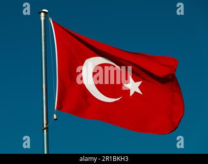 Turkish national flag over blue sky Stock Photo - Alamy