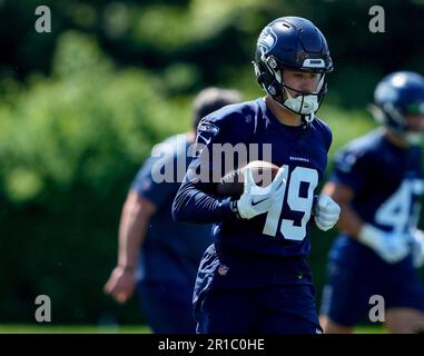 Seattle Seahawks wide receiver Jake Bobo (19) smiles while walking off ...