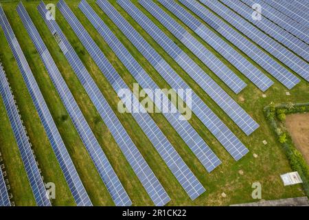 Renewable energy. Aerial shot drones fly over a photovoltaic power ...