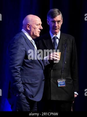 Jacob Rees Mogg (right) chats with Lord Peter Cruddas during the ...