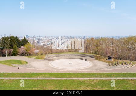 Panoramic view of Sapporo city and Asahiyama Memorial Park at spring in ...
