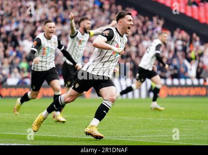Notts County's Cedwyn Scott celebrates after scoring the winning ...
