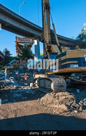 A drilling rig for digging drilled shafts to support freeway on-ramps ...