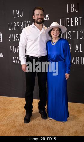 LBJ daughter LUCI BAINES JOHNSON (in blue dress) poses with her sister ...