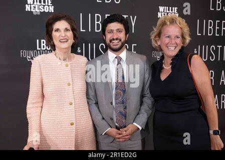 LYNDA ROBB, daughter of LBJ, poses with former member of Congress EDDIE ...