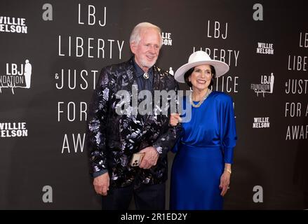 LUCI JOHNSON poses with family friend JOE BATSON of Amarillo, Texas on ...