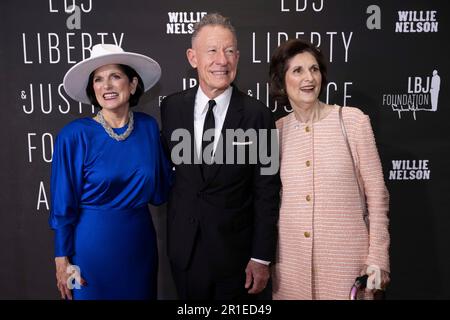 LBJ daughter LYNDA ROBB, l, poses with Congressman GREG CASAR and ...