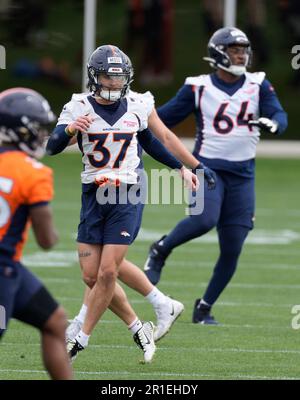 Denver Broncos cornerback Riley Moss takes part in drills during an NFL ...
