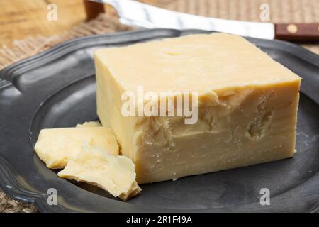 British cheeses collection, English matured smoked cheddar cheese close ...