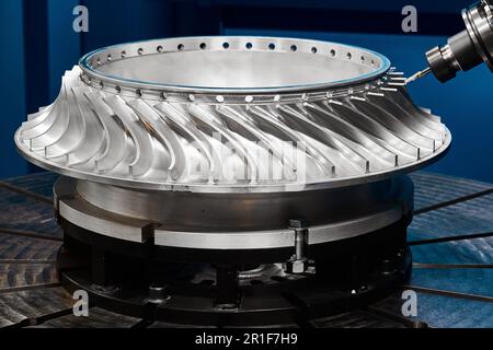 Five-axis milling machine makes turbine wheel at plant Stock Photo - Alamy