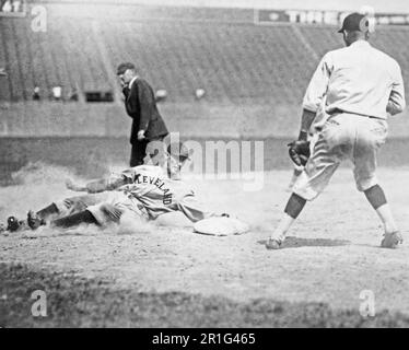 Cleveland base runner, Chick Fewster, slides safely into 3rd base ...