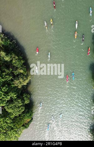 HANGZHOU, CHINA - MAY 14, 2023 - Participants take part in a kayaking ...