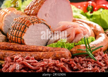 Assorted meat products including ham and sausages Stock Photo - Alamy