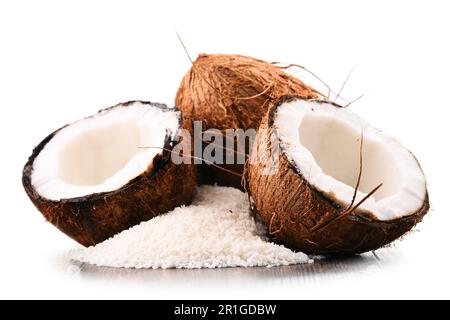 Composition with shredded coconut and shells isolated on white ...