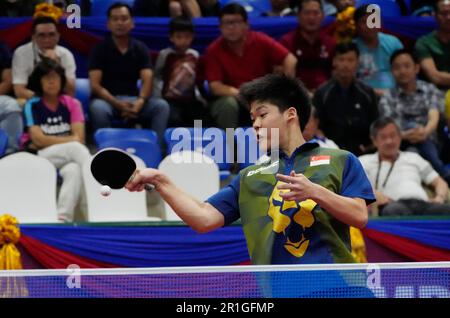 Singapore's Yong Isaac Quek returns a shot during men's doubles semi ...