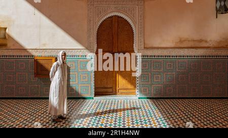 Meknes, Morocco - September 2022: Moroccan man walking inside mausoleum ...