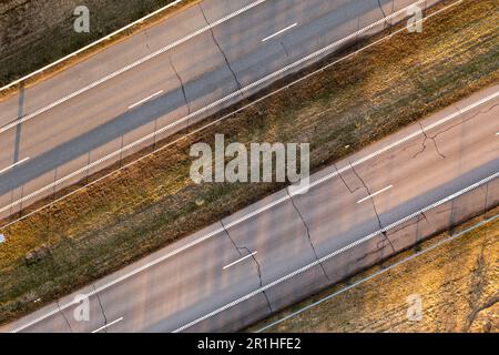 Drone photography of parallel highway lanes during spring evening Stock ...