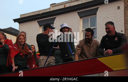 Wrexham FC owners on bus parade celebrating the clubs success in the ...