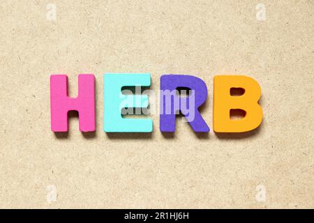 Alphabet letter in word herb on green grass background Stock Photo - Alamy