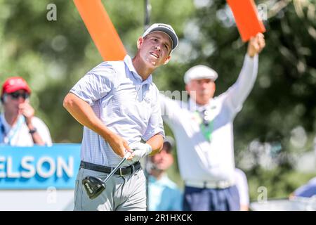 Sam Stevens hits his tee shot on the seventh hole during the first ...