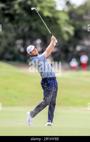 Scottie Scheffler hits his approach shot to the second green during the ...